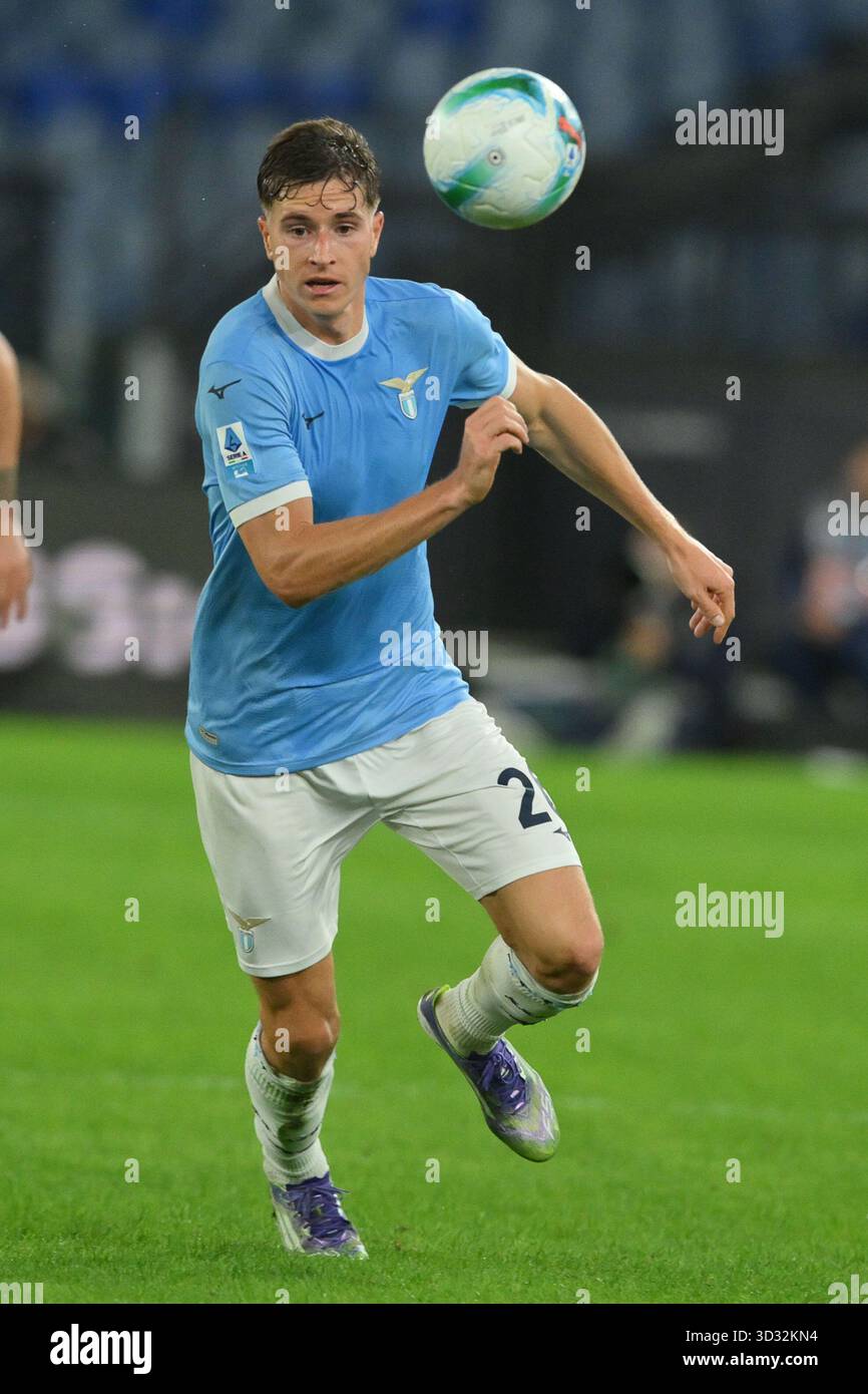 Toma Basic of SS Lazio runs with the ball during the match of 10th day ...