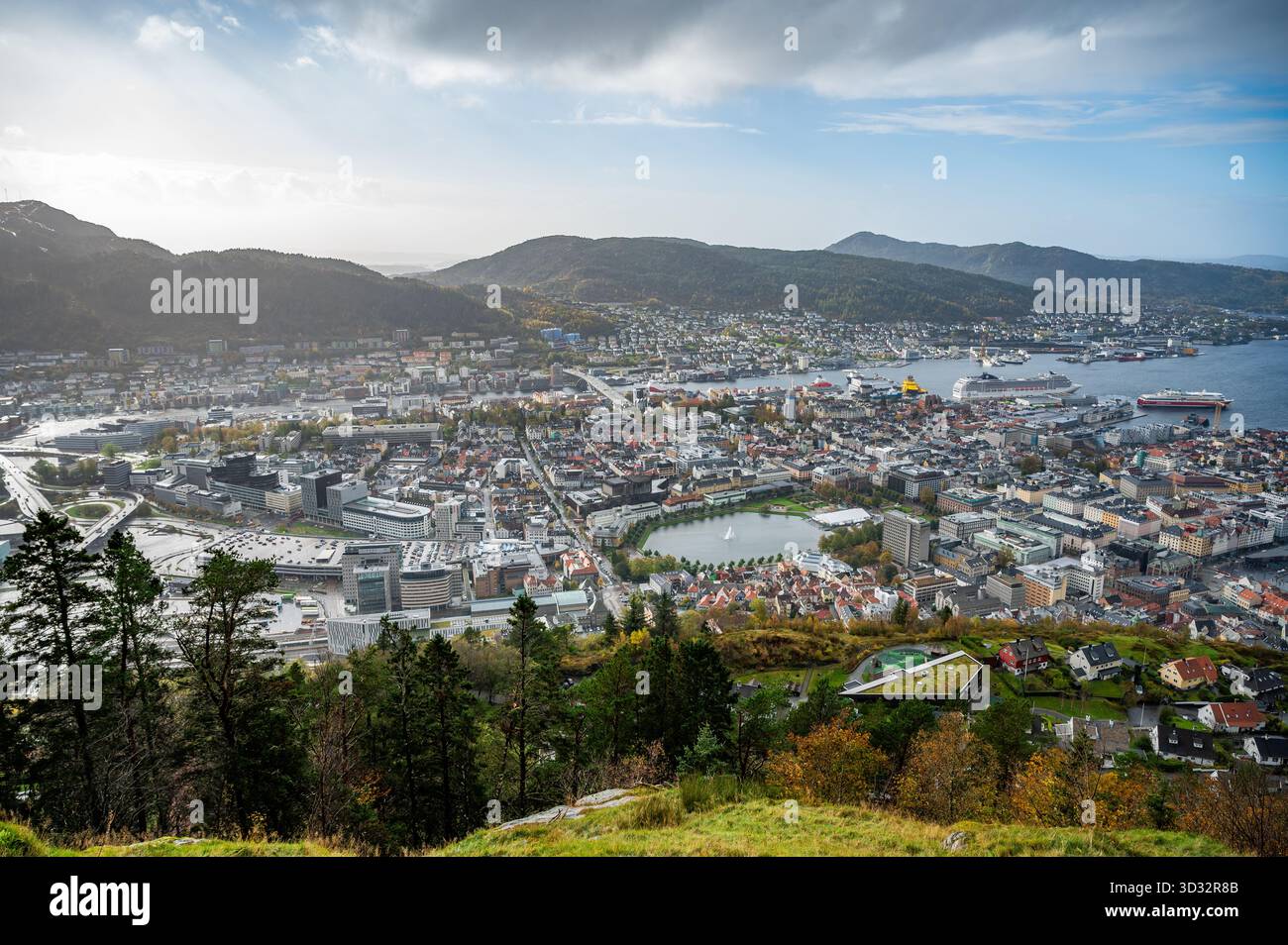 Bergen, Norway, panoramic view of the bustling city nestled between ...