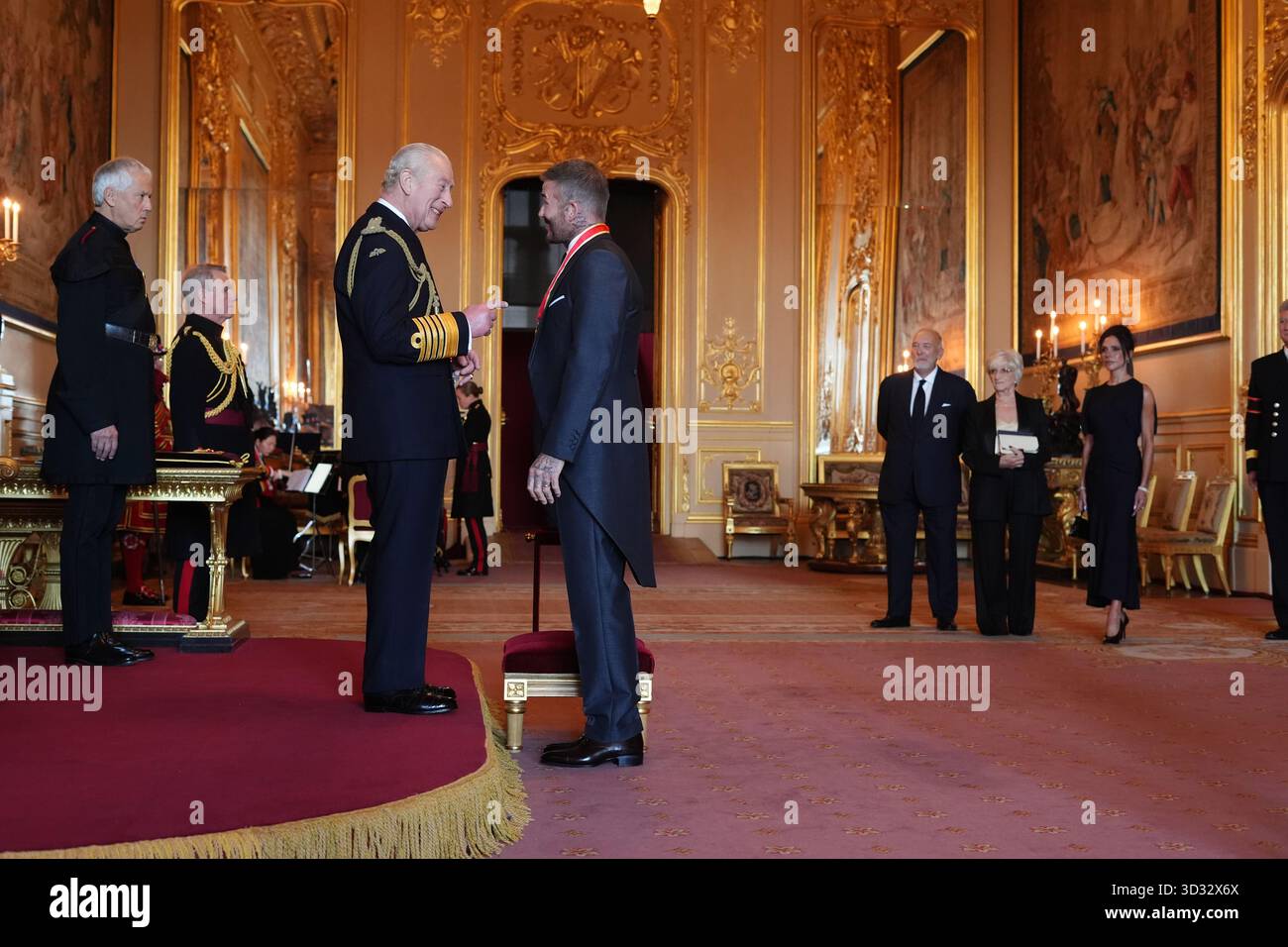 Sir David Beckham is made a Knight Bachelor by King Charles III during ...