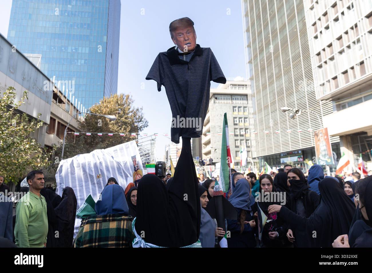 Protesters carry effigies of U.S. President Donald Trump during a rally ...