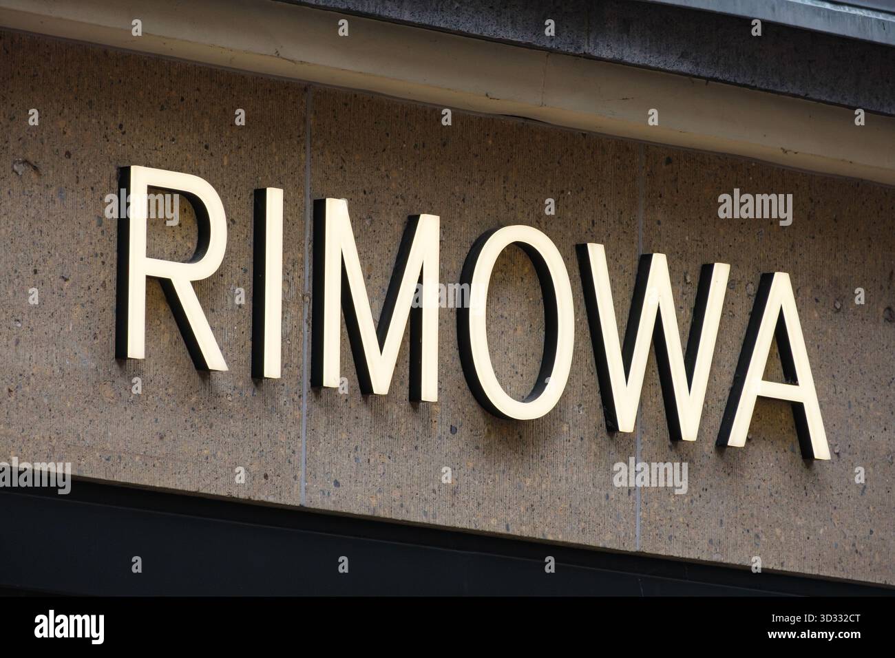 Rimowa brand logo on the exterior of a store Stock Photo - Alamy