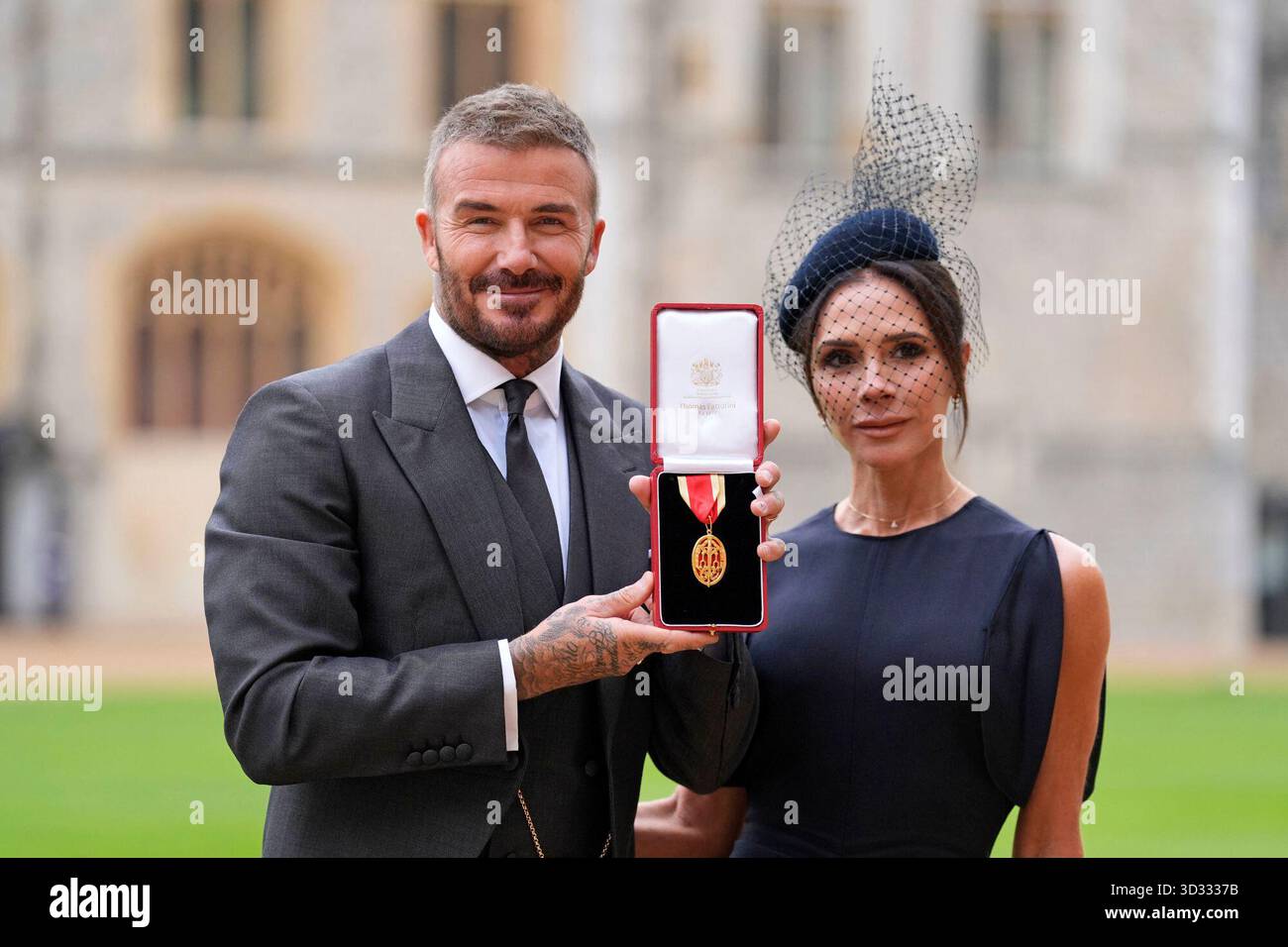Sir David Beckham, with his wife Lady Victoria, after he was made a ...