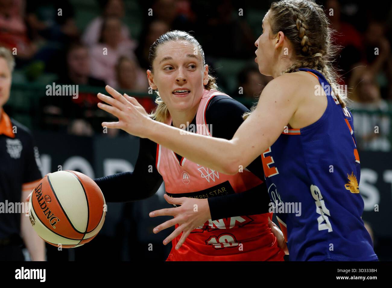 Tegan Graham of the Lynx drives past Miela Sowah of the Fire during the ...