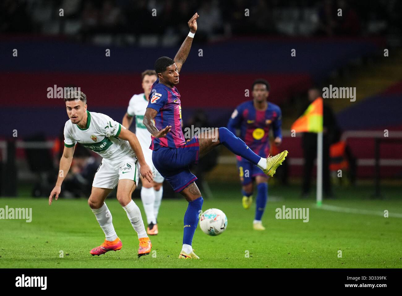 Marcus Rashford of FC Barcelona and Adria Pedrosa of Elche CF during ...