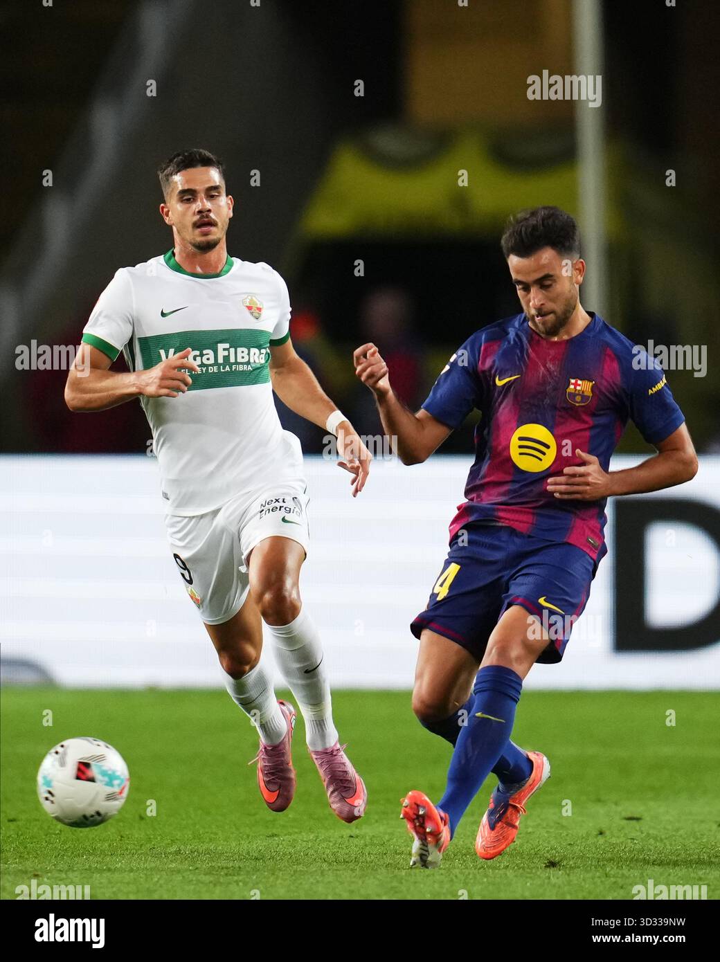 Andre Silva of Elche CF and Eric Garcia of FC Barcelona during the La ...