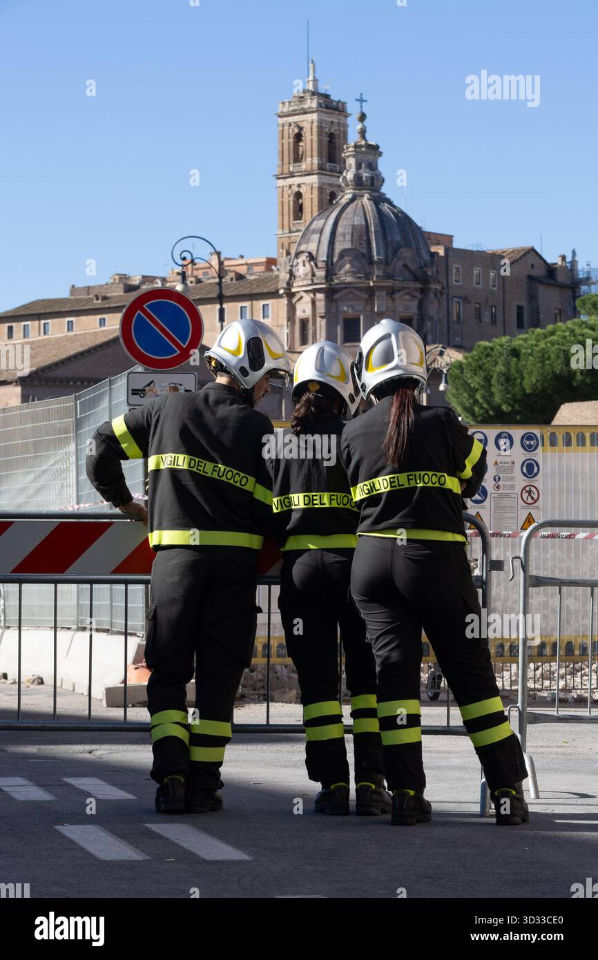 Firefighters near the Torre dei Conti, which partially collapsed ...
