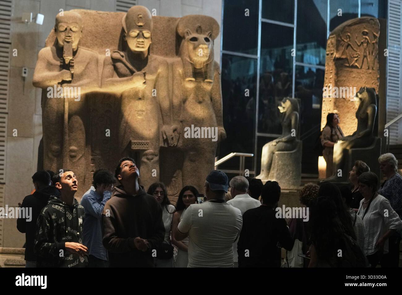 A man looks up during the first day for visitors after the official ...