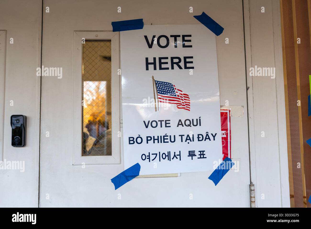 Voters cast their ballots at a polling station on Election Day morning ...
