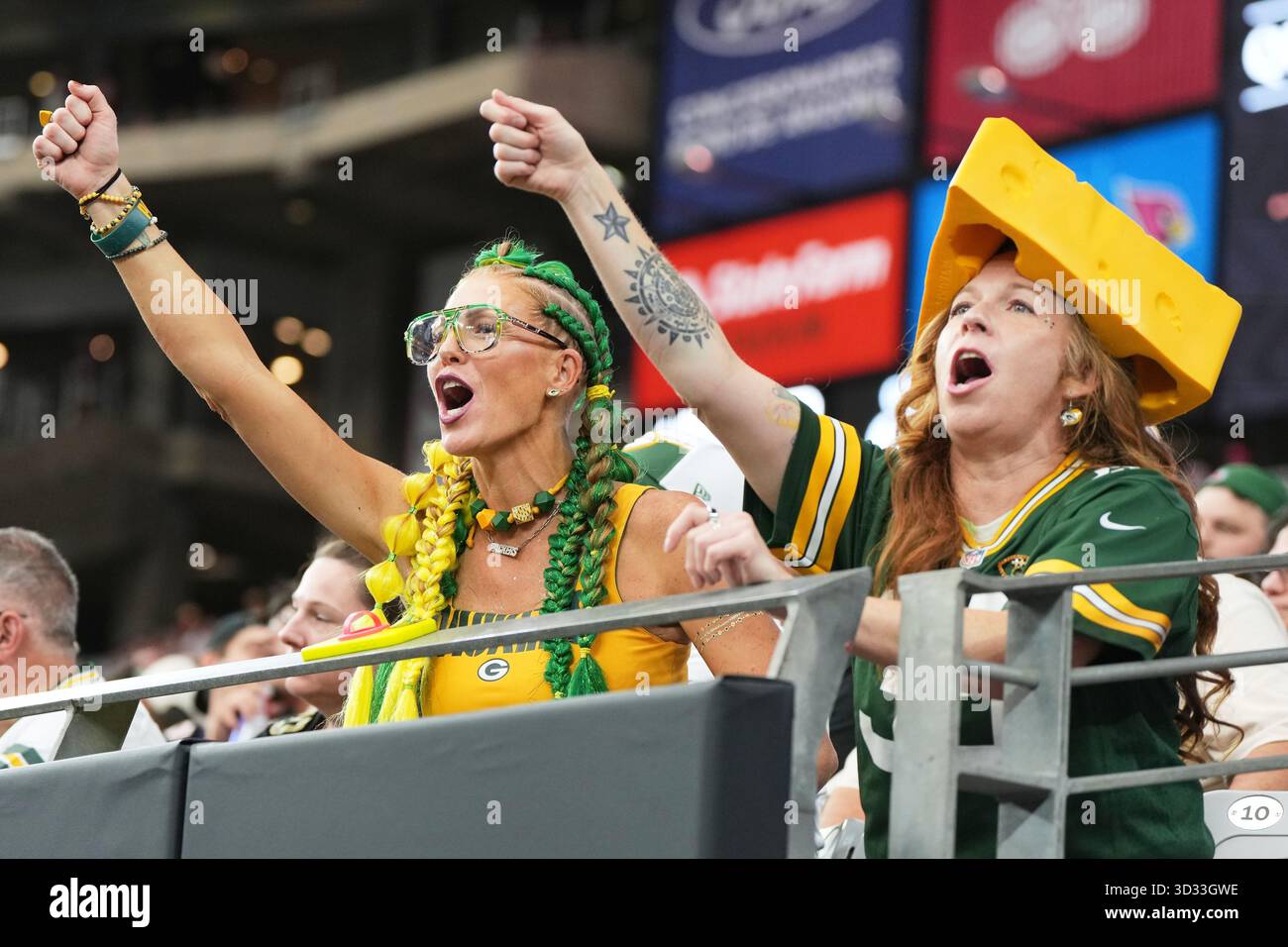FILE - Green Bay Packers fans cheer during the first half of an NFL ...