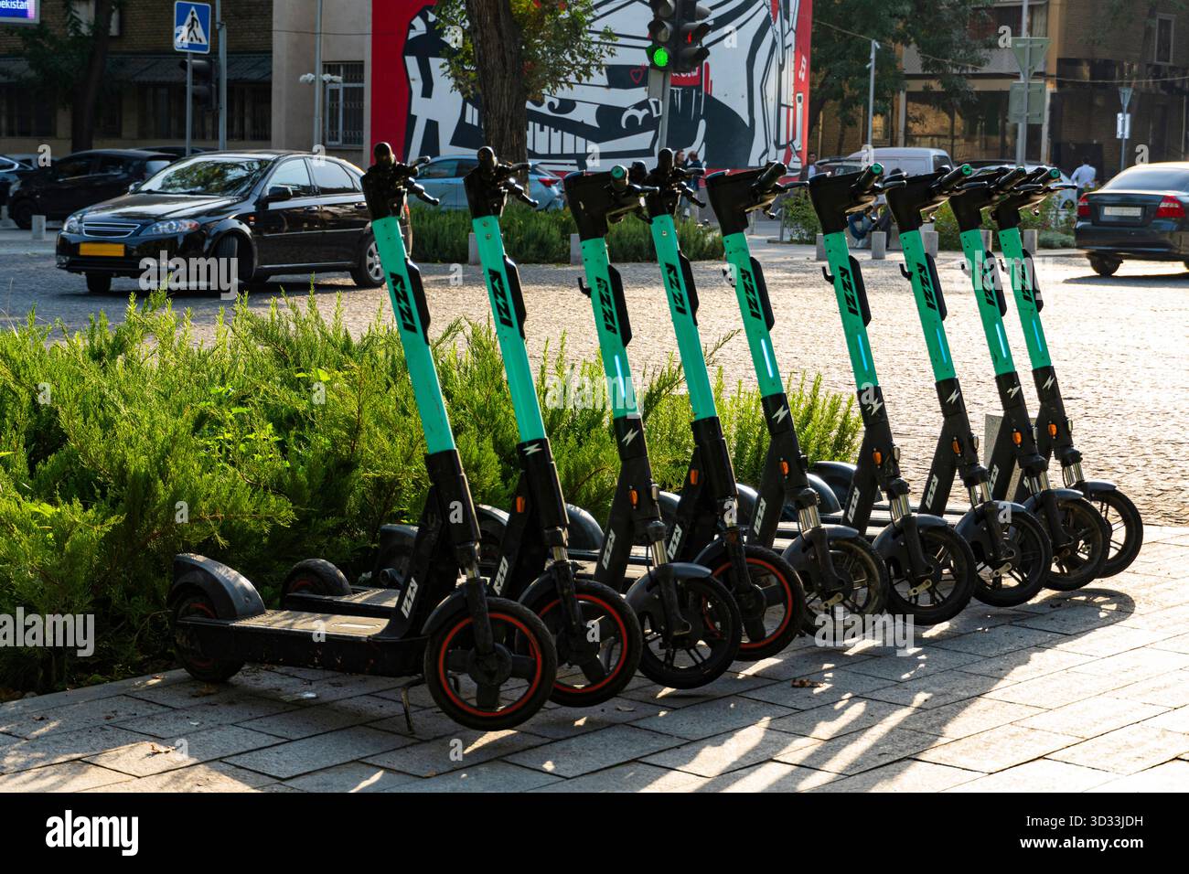 Tashkent, Uzbekistan, October, 2025. Row of electric rental scooters ...