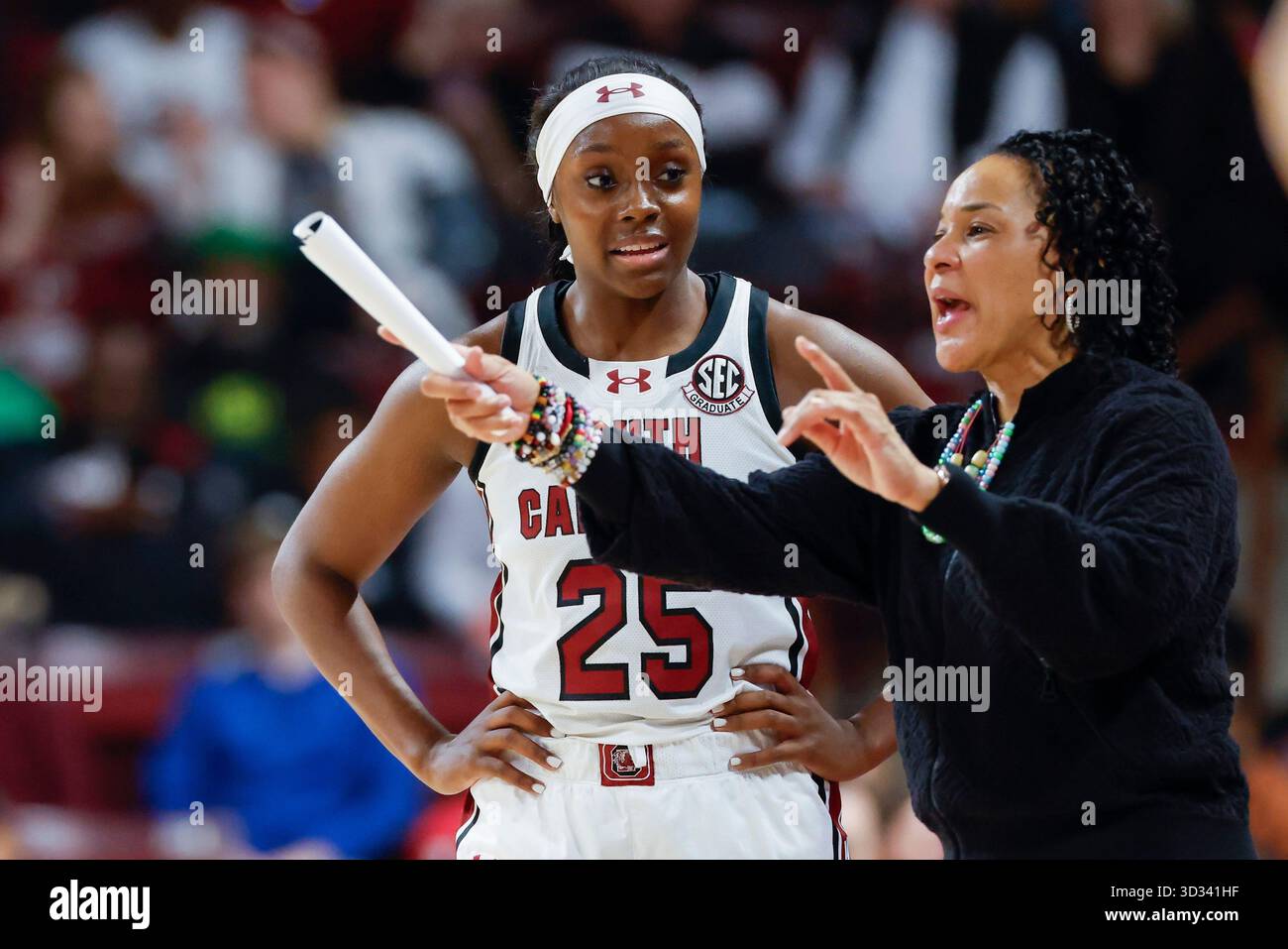 South Carolina head coach Dawn Staley talks to guard Raven Johnson (25 ...