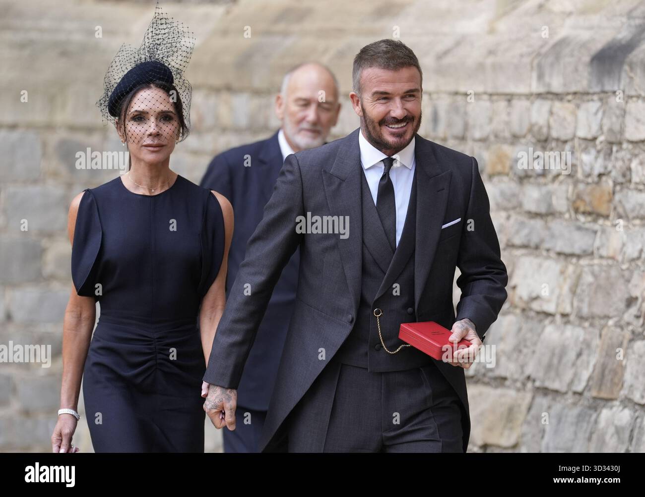 Sir David Beckham, with his wife Victoria, after he was made a Knight ...