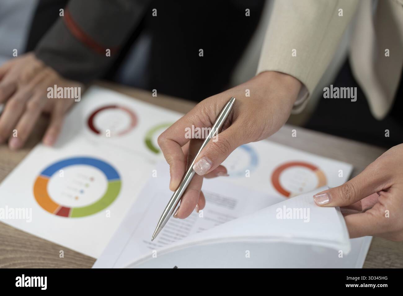 Woman reviewing data writing hi-res stock photography and images - Alamy