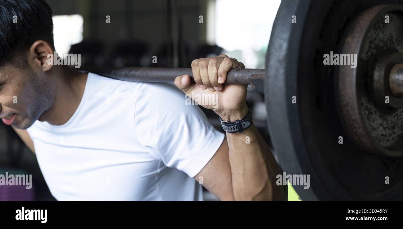 Focused individual demonstrates strength hi-res stock photography and ...