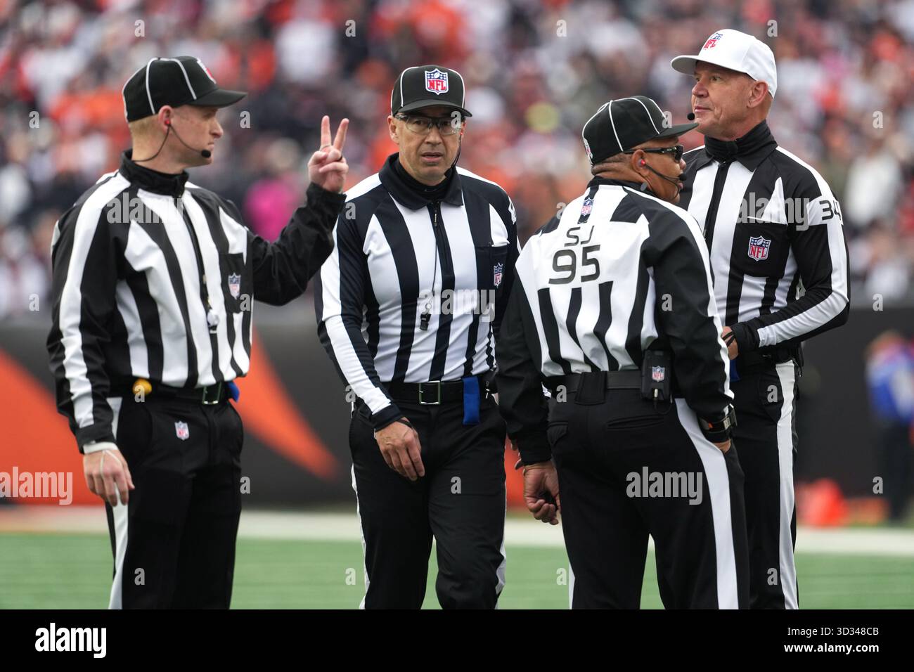 NFL Referee Clete Blakeman, far right, talks to umpire Scott Campbell ...