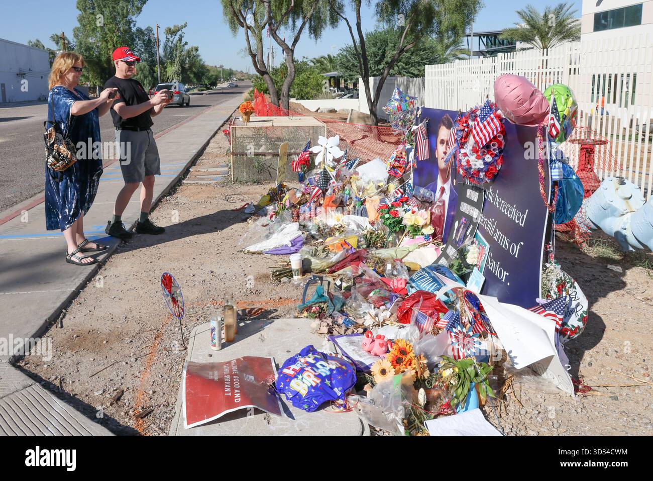 Handwritten chalk messages in memory of Charlie Kirk are in front of ...