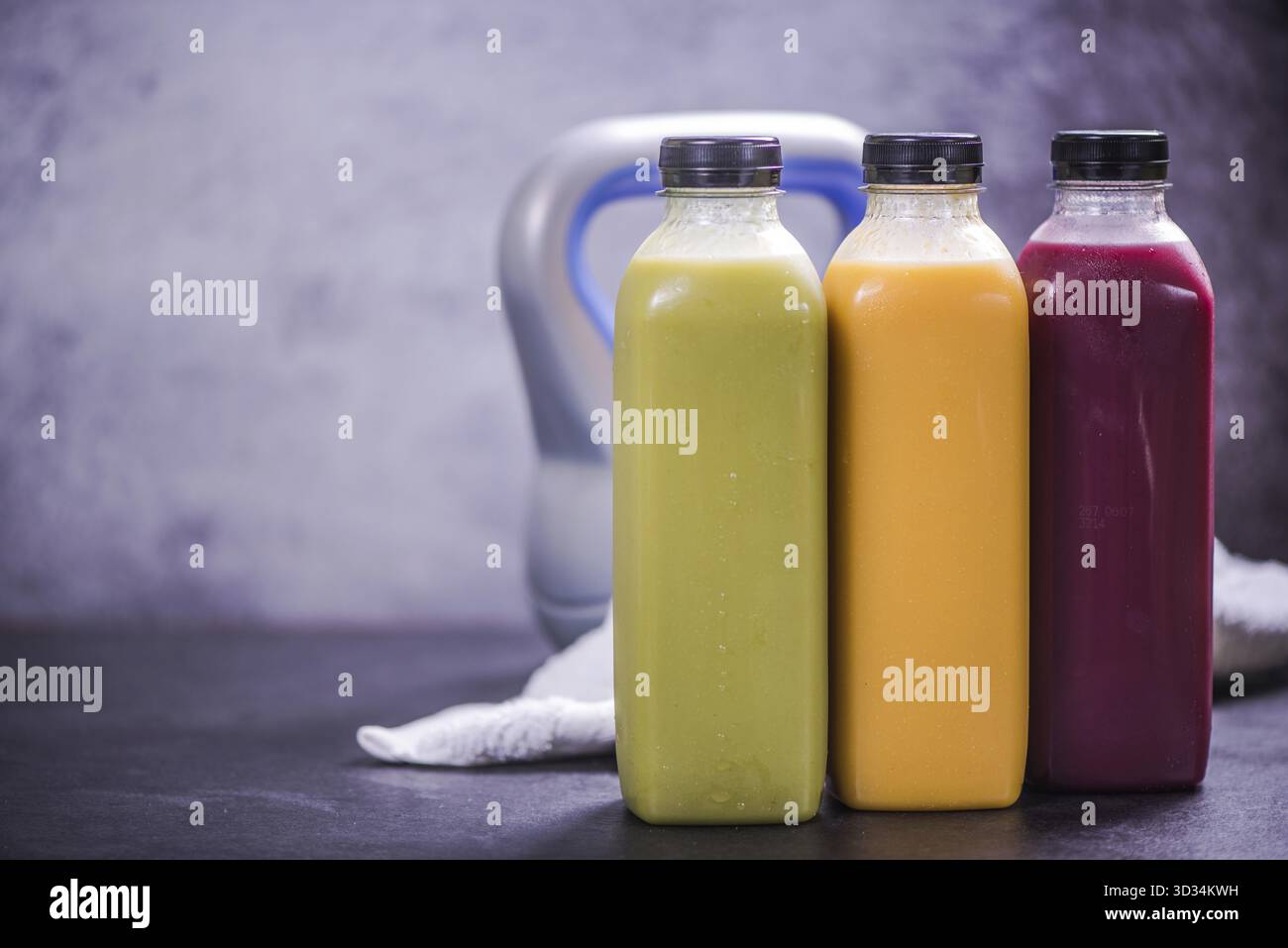 Set of natural energy drinks in gym, pre and after workout Stock Photo ...
