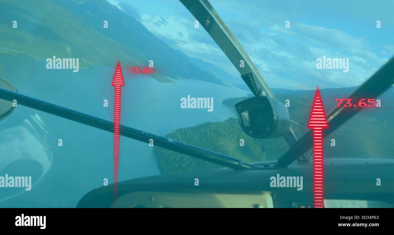 Showing cockpit frame and panel edge with struts over mountain lake ...