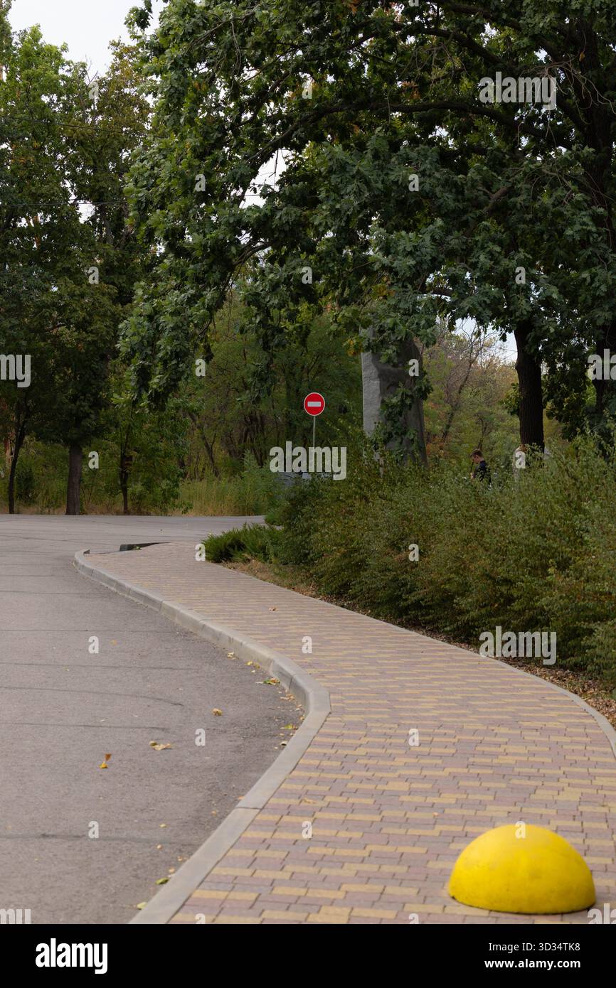 A pedestrian path with a no entry sign Stock Photo - Alamy
