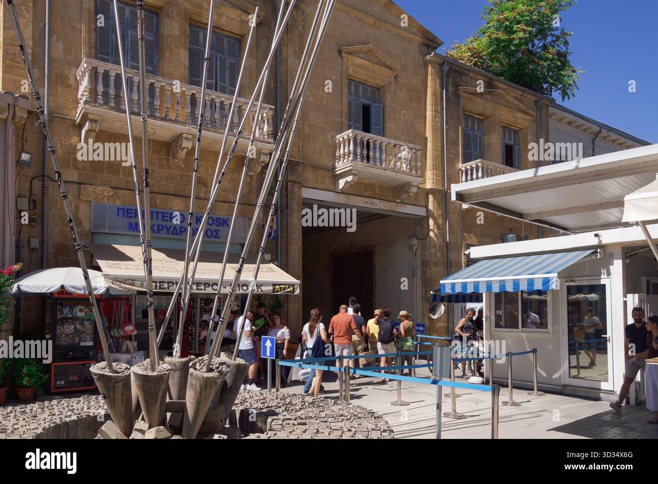 Nicosia, Cyprus People queue at the Ledra Street checkpoint beside a ...
