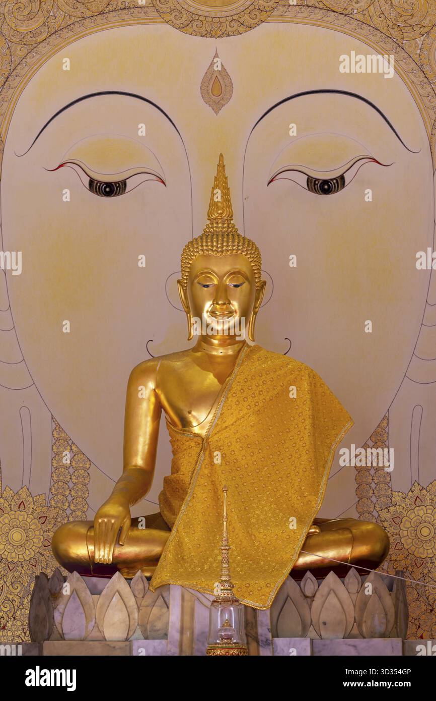 Golden Buddha statue with tunic, Bhumispara mudra, Buddha Gautama at ...