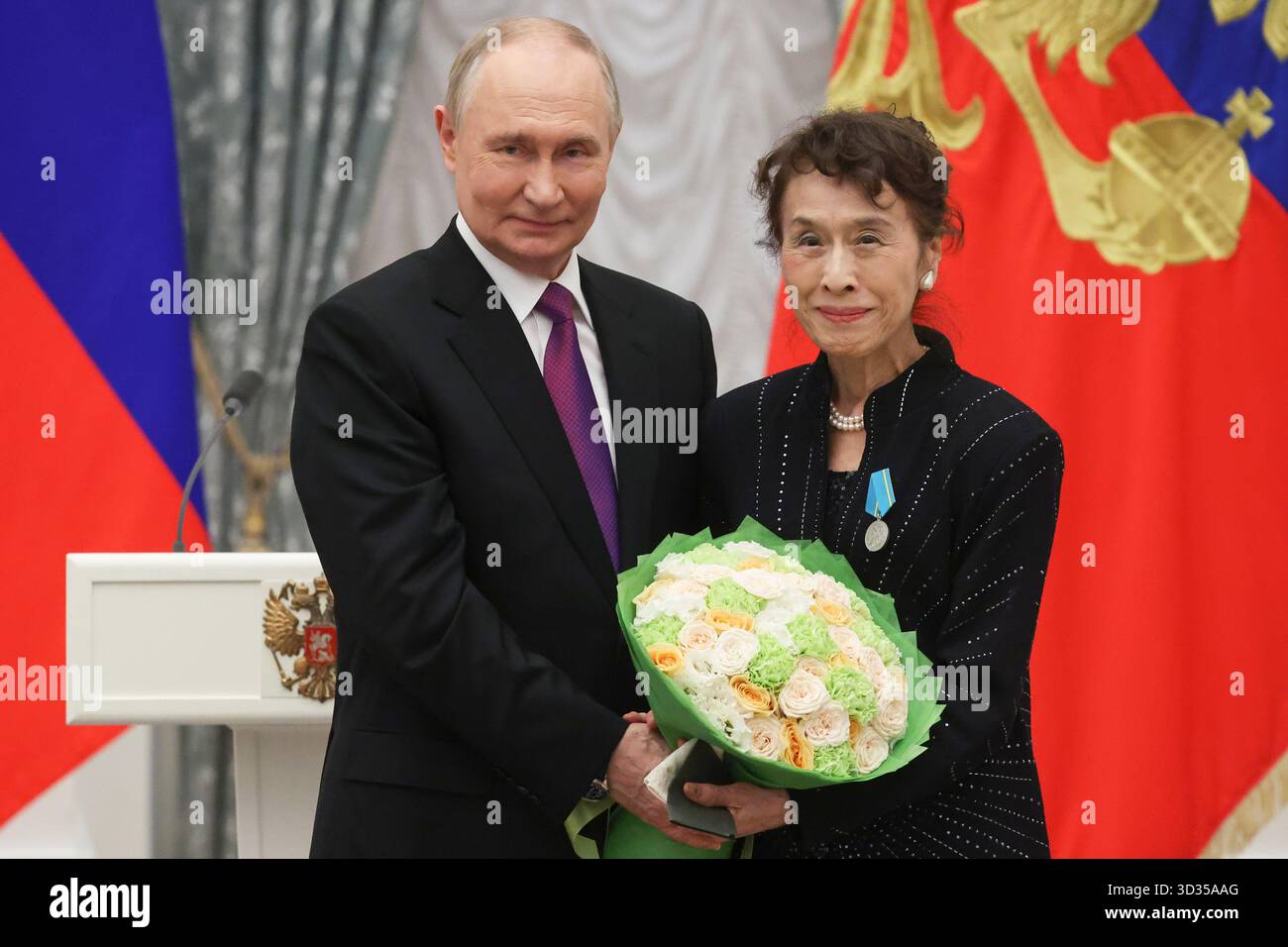 Russian President Vladimir Putin, left, awards Japanese actress Komaki ...