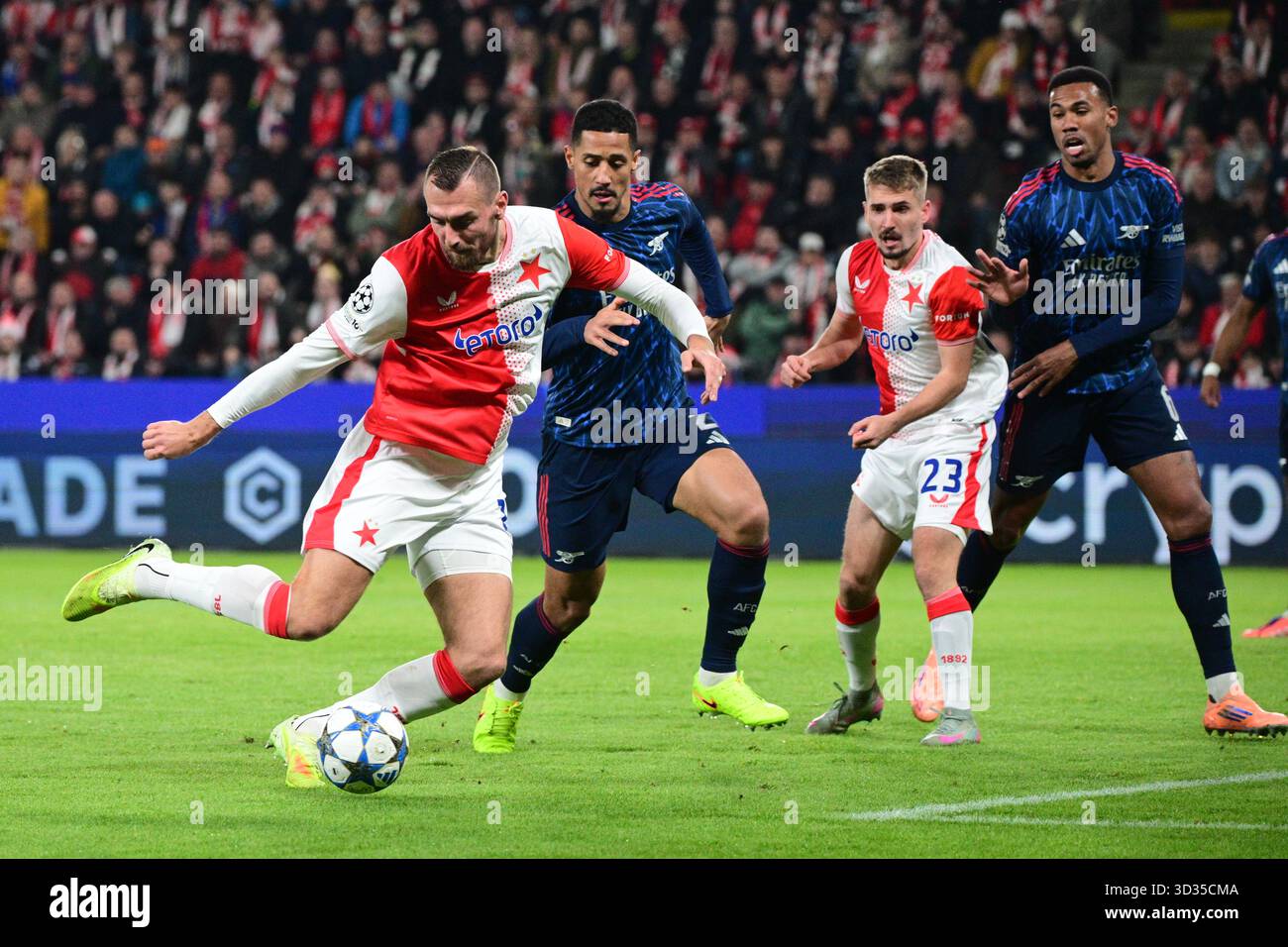 From left Tomas Chory of Slavia, William Saliba of Arsenal, Michal ...