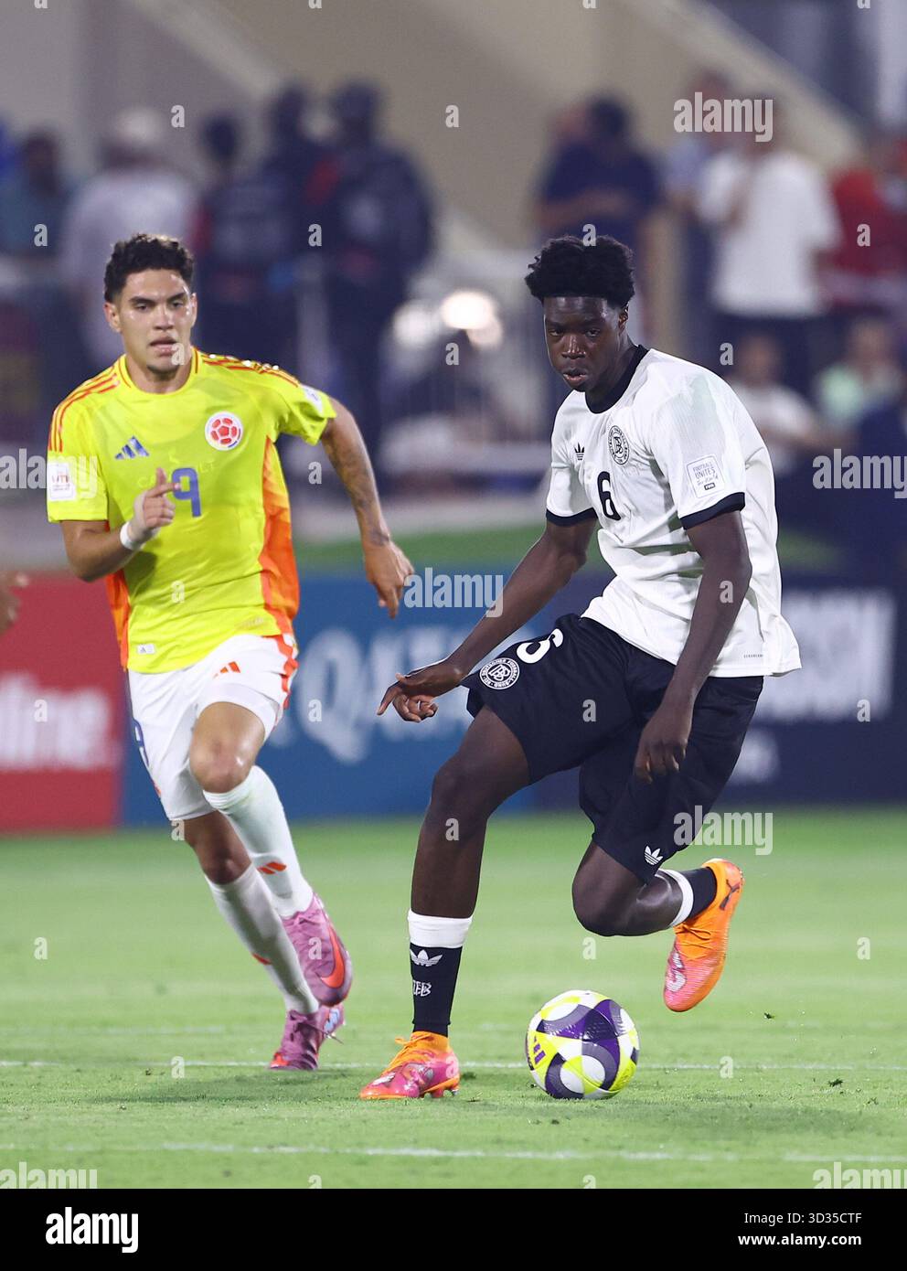 from left: Santiago Londono, Mussa Kaba (Germany) Doha, November 4 ...
