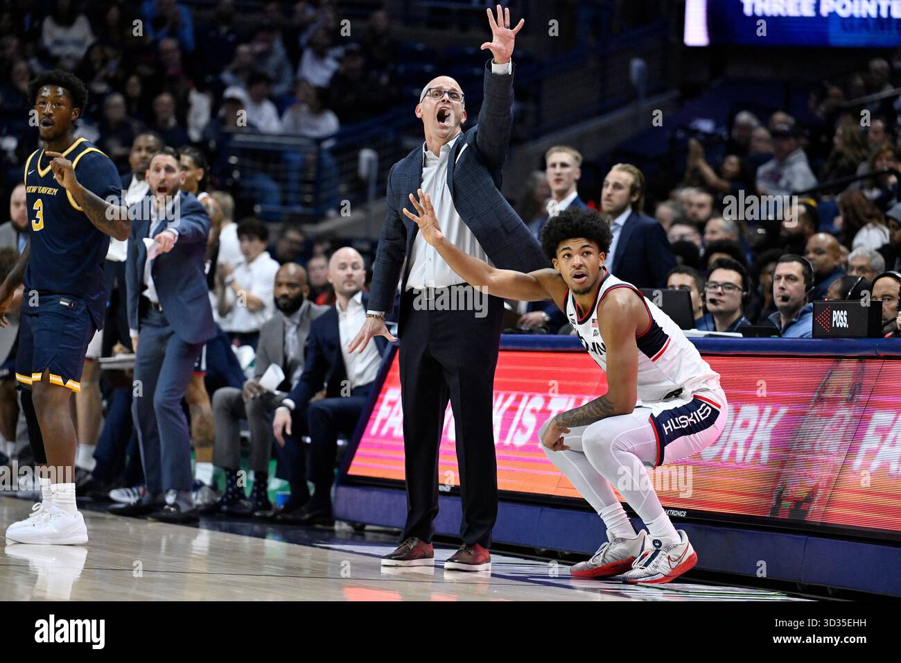 UConn head coach Dan Hurley and UConn forward Jaylin Stewart, right ...