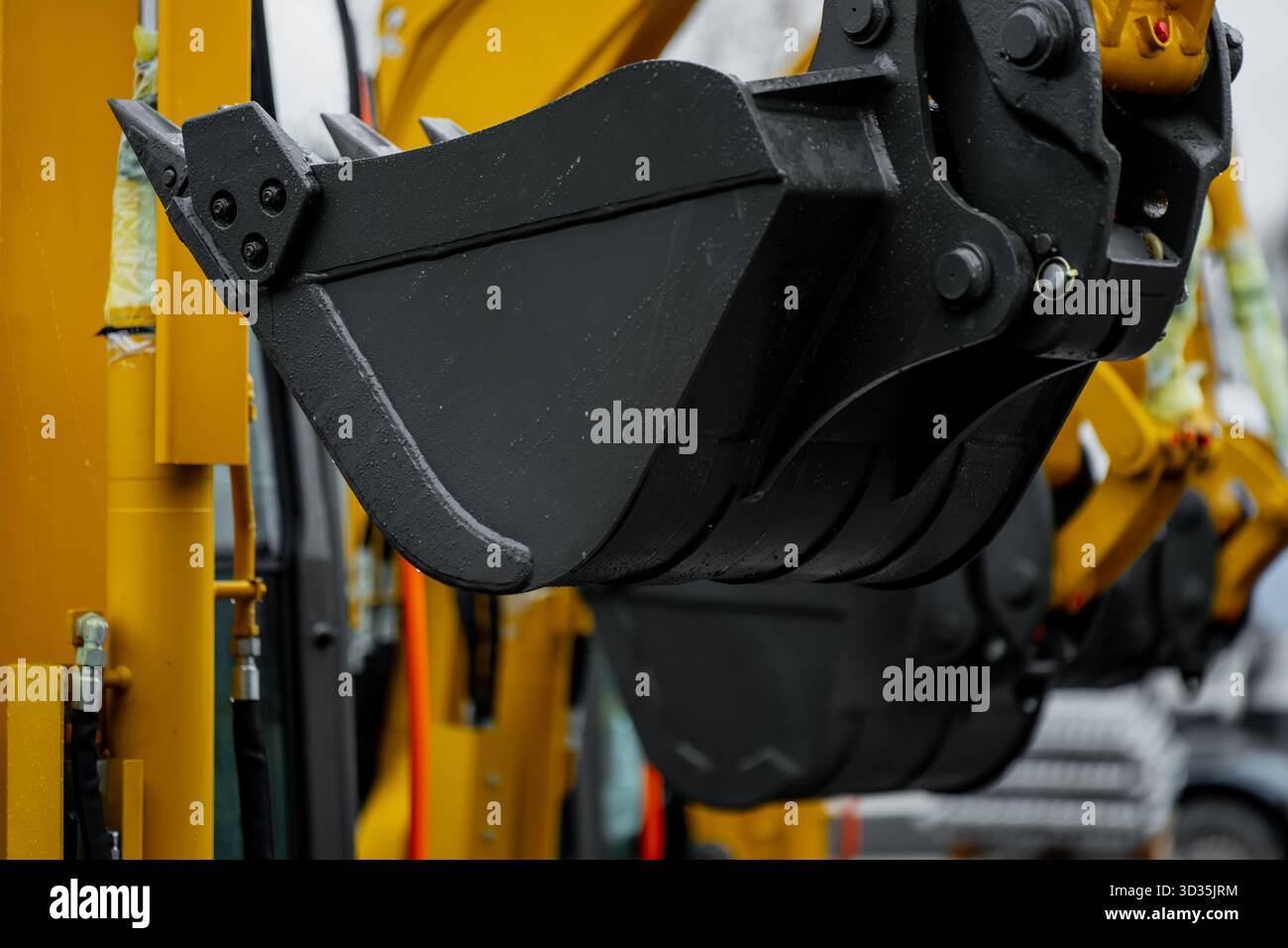 Industrial excavator bucket assembly featuring welded reinforcement ...
