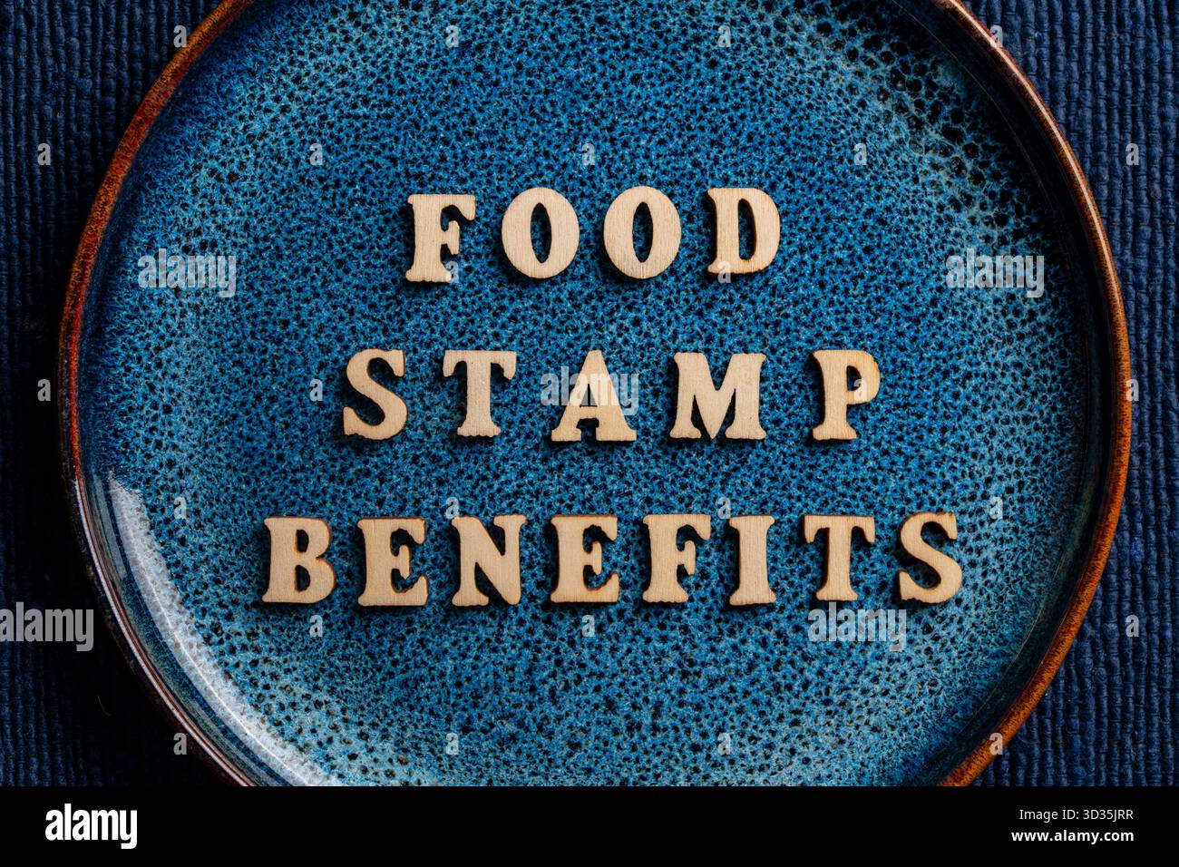 The inscription on the blue plate about food stamp benefits, close up ...