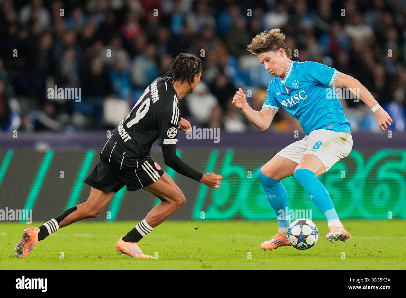 Napoli's Scott McTominay, right, and Frankfurt's Jean-Matteo Bahoya vie ...