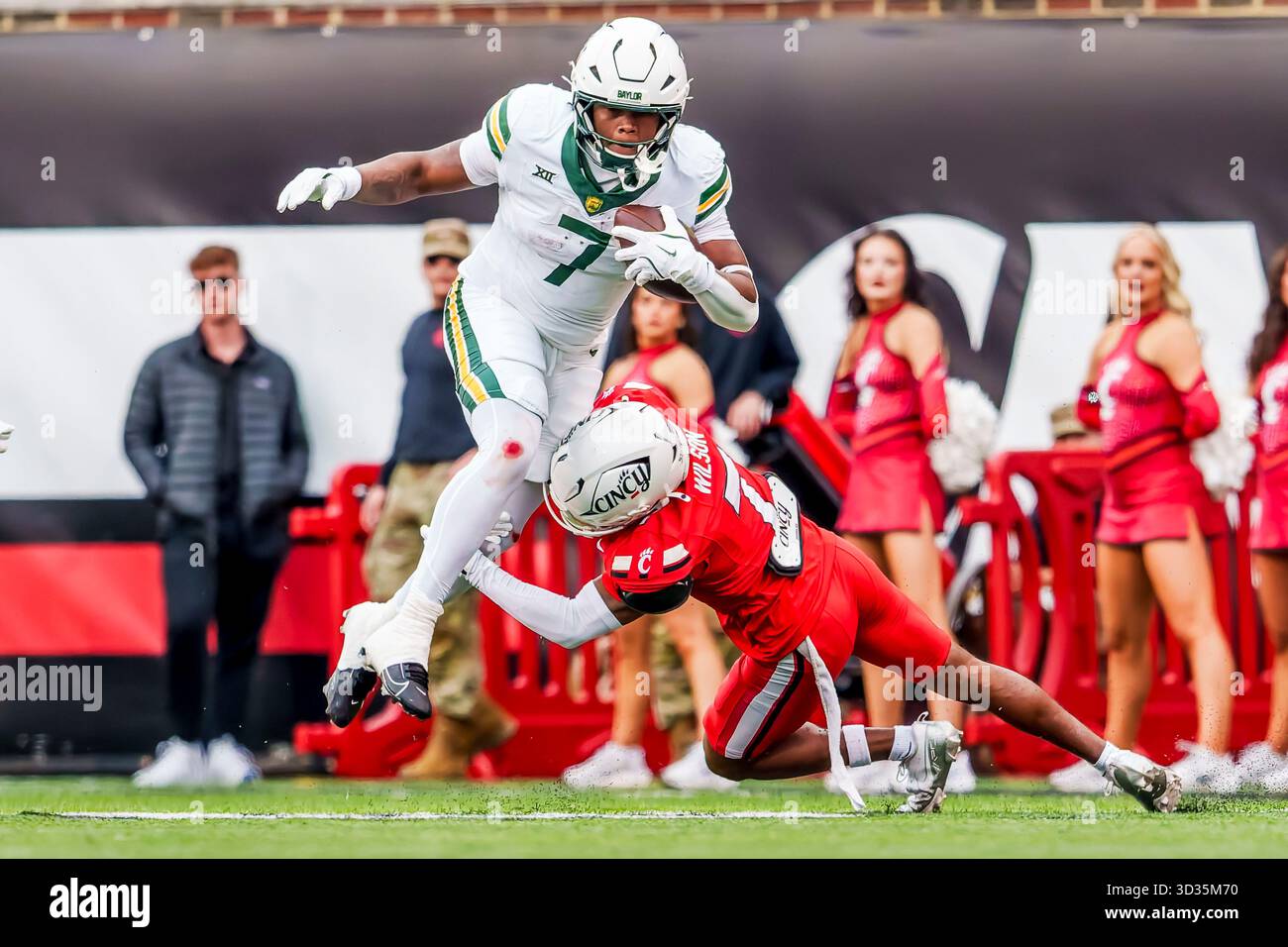 Baylor running back Bryson Washington (7) is tackled by Cincinnati ...