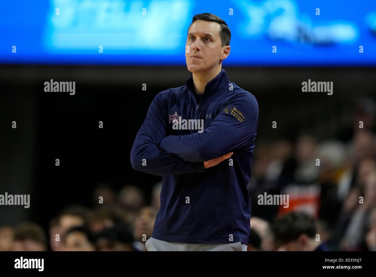 Fairleigh Dickinson head coach Jack Castleberry watches from the bench ...