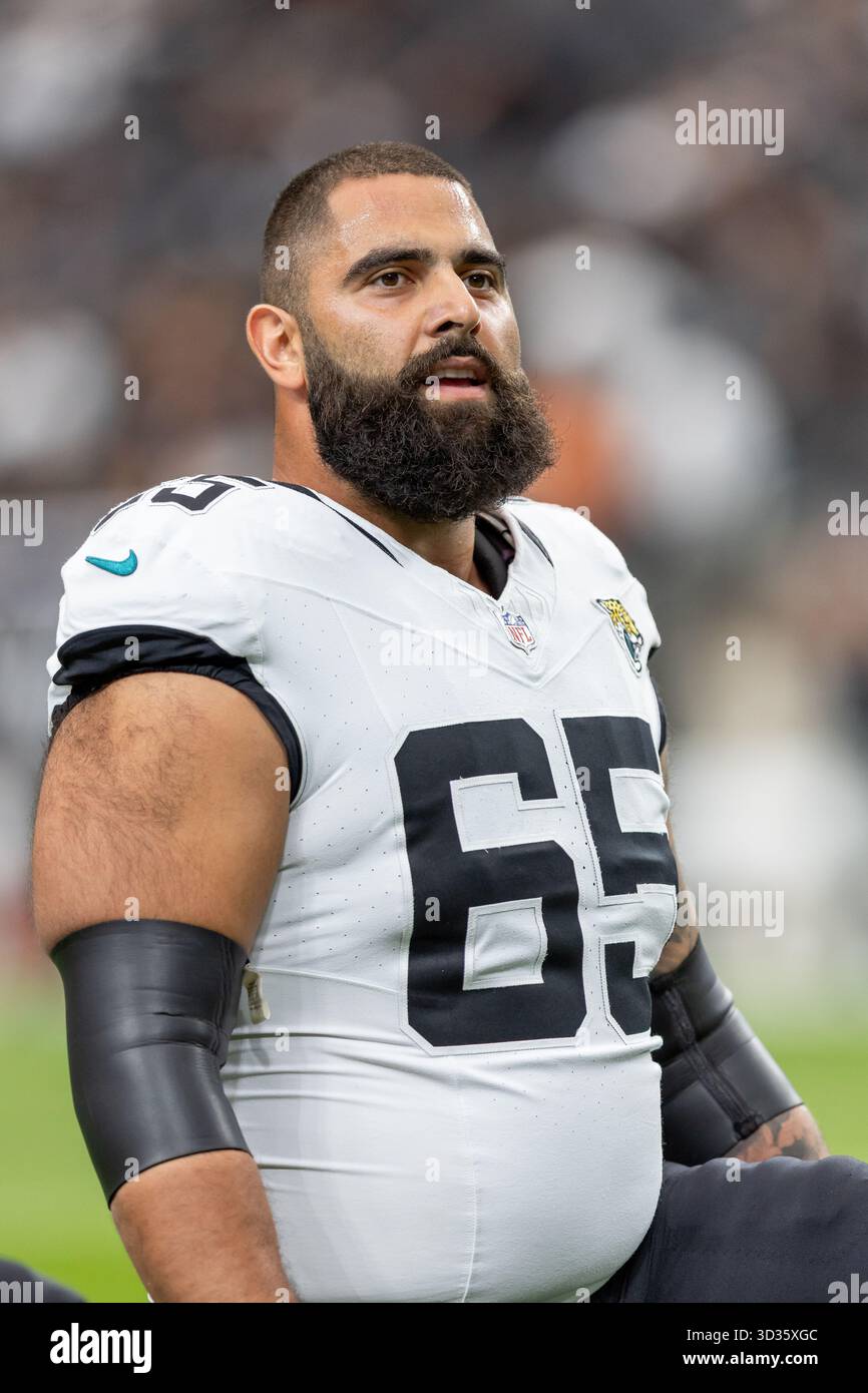 Jacksonville Jaguars offensive lineman Patrick Mekari (65) warms up ...