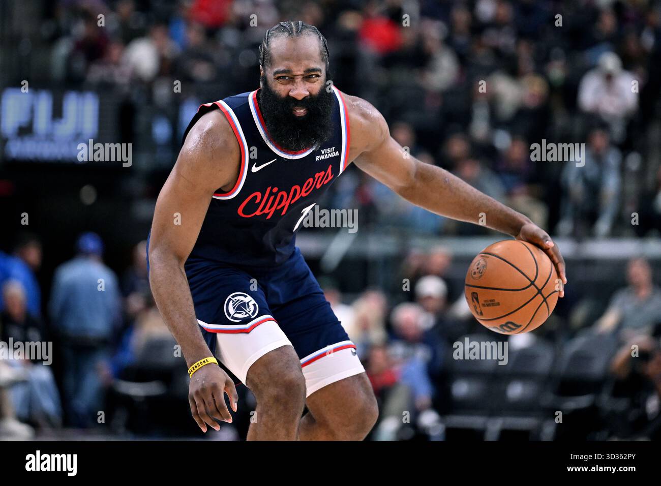 Los Angeles Clippers guard James Harden dribbles against Miami Heat of ...
