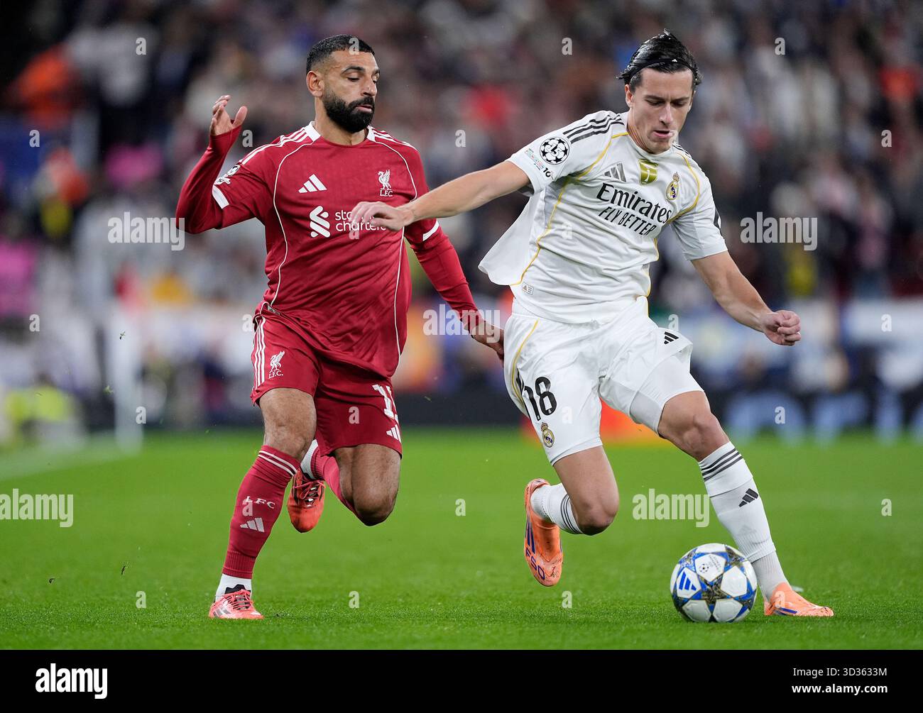 Liverpool's Mohamed Salah (left) and Real Madrid's Alvaro Carreras ...