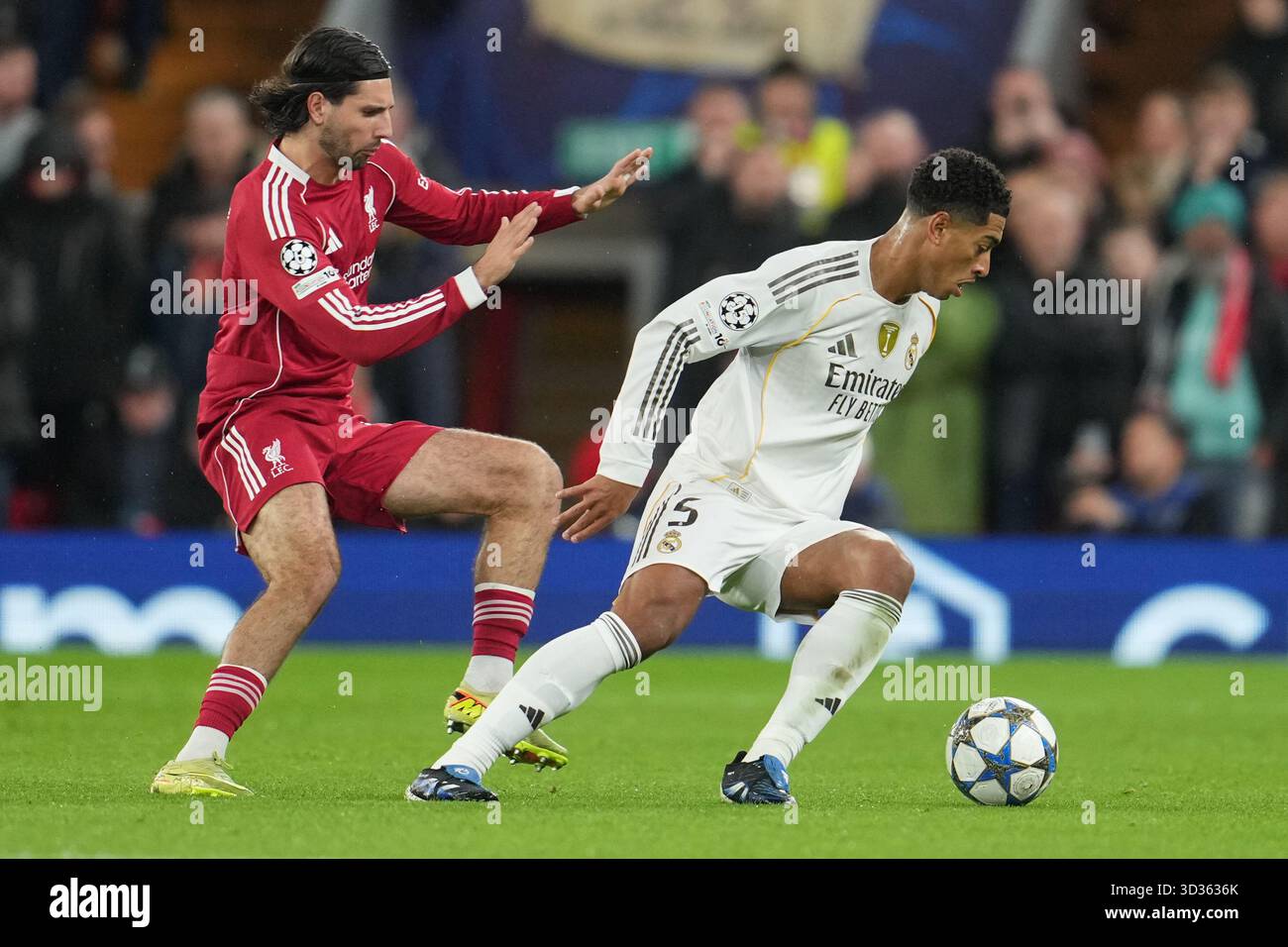 Liverpool's Dominik Szoboszlai, left, and Real Madrid's Jude Bellingham ...