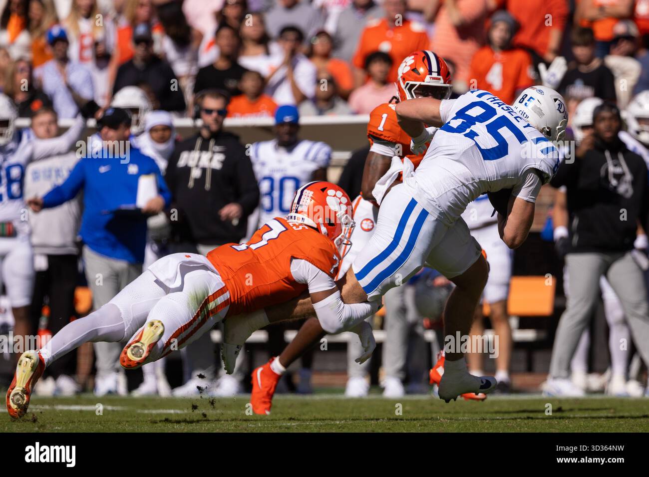 Clemson safety Khalil Barnes (7) tackles Duke tight end Jeremiah Hasley ...