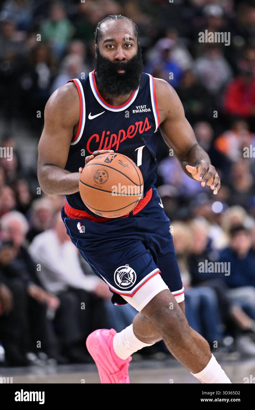 Los Angeles Clippers guard James Harden (1) dribbles against Miami Heat ...