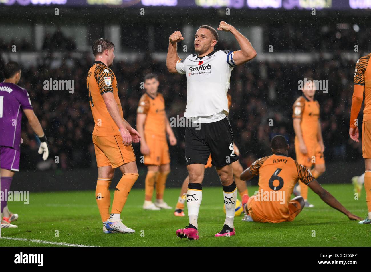 Derby County's Carlton Morris (centre) celebrates scoring his sides ...