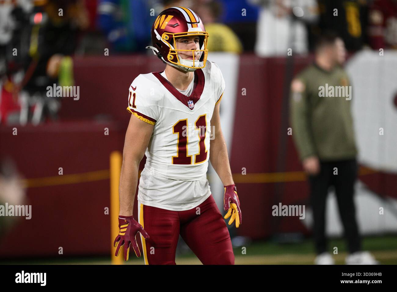Washington Commanders wide receiver Luke McCaffrey (11) warms up before ...