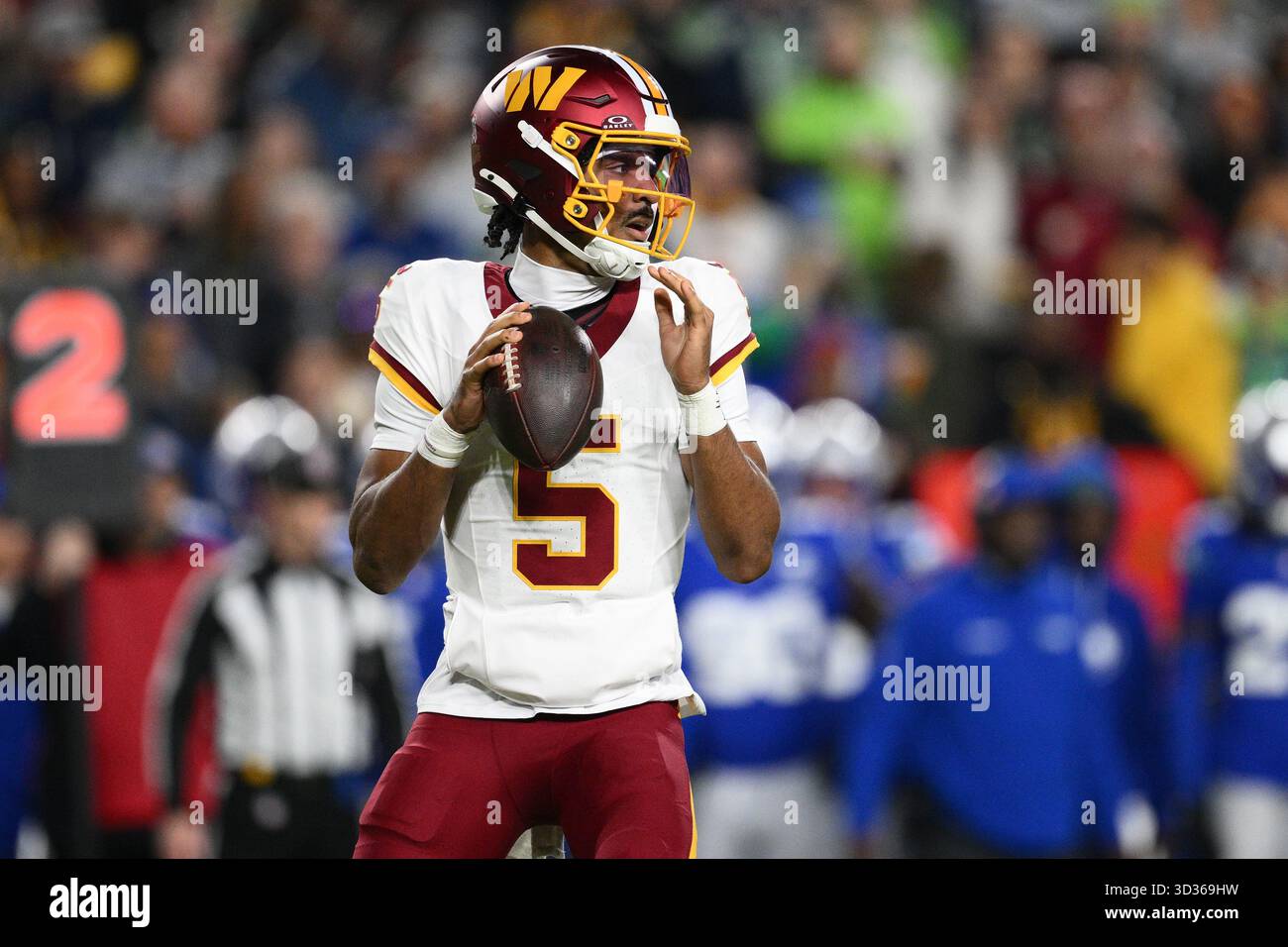 Washington Commanders quarterback Jayden Daniels (5) in action during ...