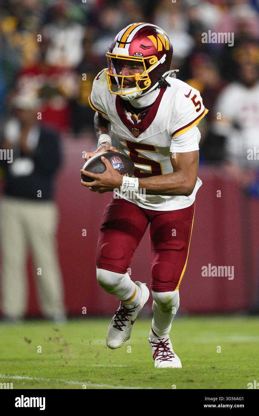 Washington Commanders quarterback Jayden Daniels (5) in action during ...