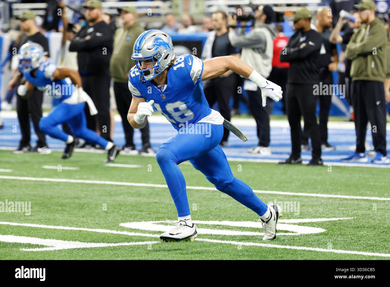 Detroit Lions wide receiver Isaac TeSlaa (18) warms up against the ...