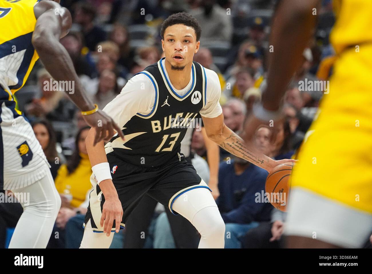 'Milwaukee Bucks guard Ryan Rollins (13) plays against the Indiana ...