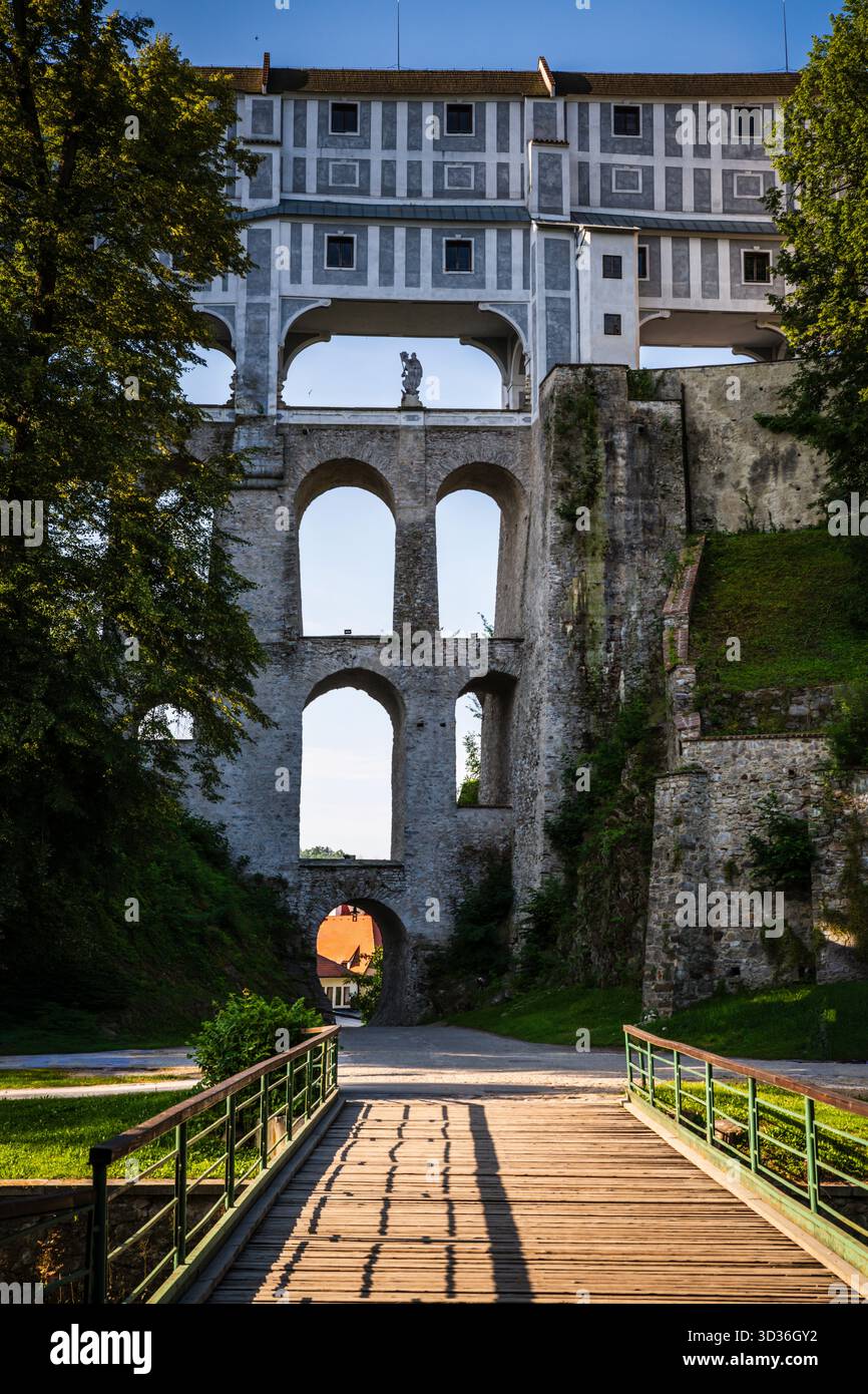 Stunning view of Cloak Bridge, a multi-arched bridge over a castle moat ...