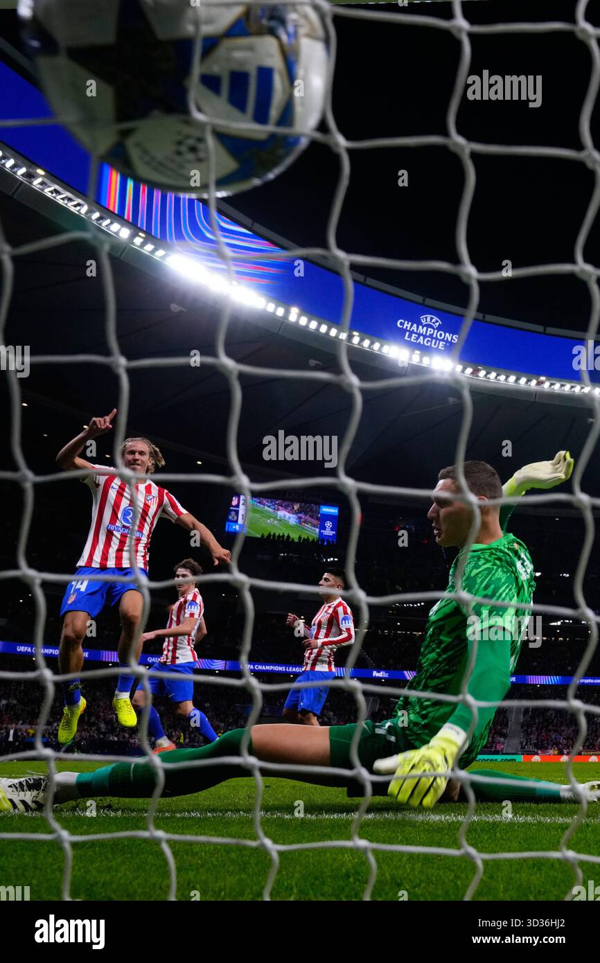 Atletico Madrid's Marcos Llorente scores his side's third goal during a ...