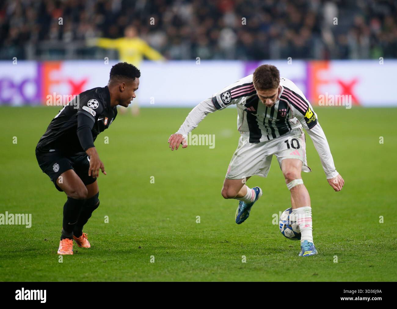 Geny Catamo of Sporting CP and Kenan Yildiz of Juventus FC during the ...