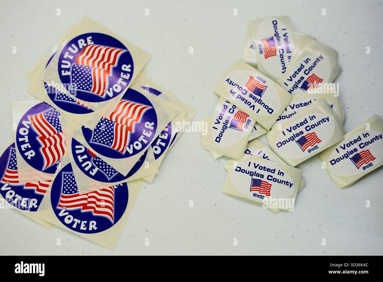 Stickers for voter's and kids are seen at a polling location inside a ...